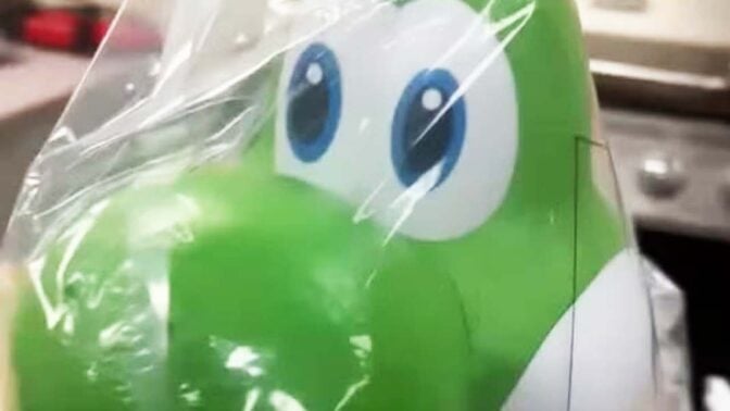Yoshi Mario Galaxy Popcorn Bucket Looks Like He Ate An Edible